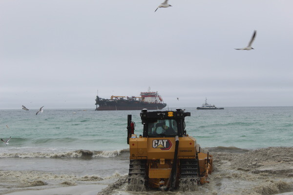Manson christens record-setting hopper dredge | WorkBoat
