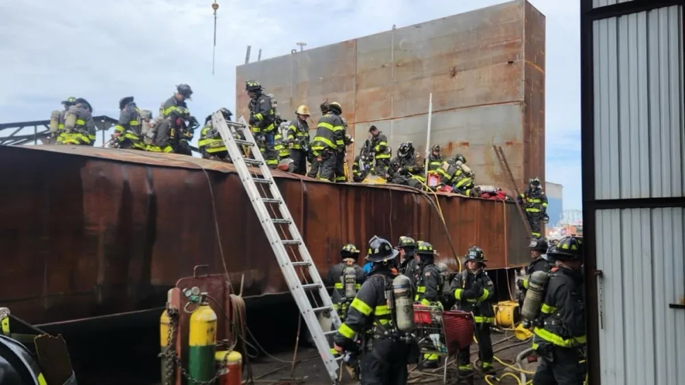 One dead, 34 firefighters injured after Staten Island shipyard fire ...